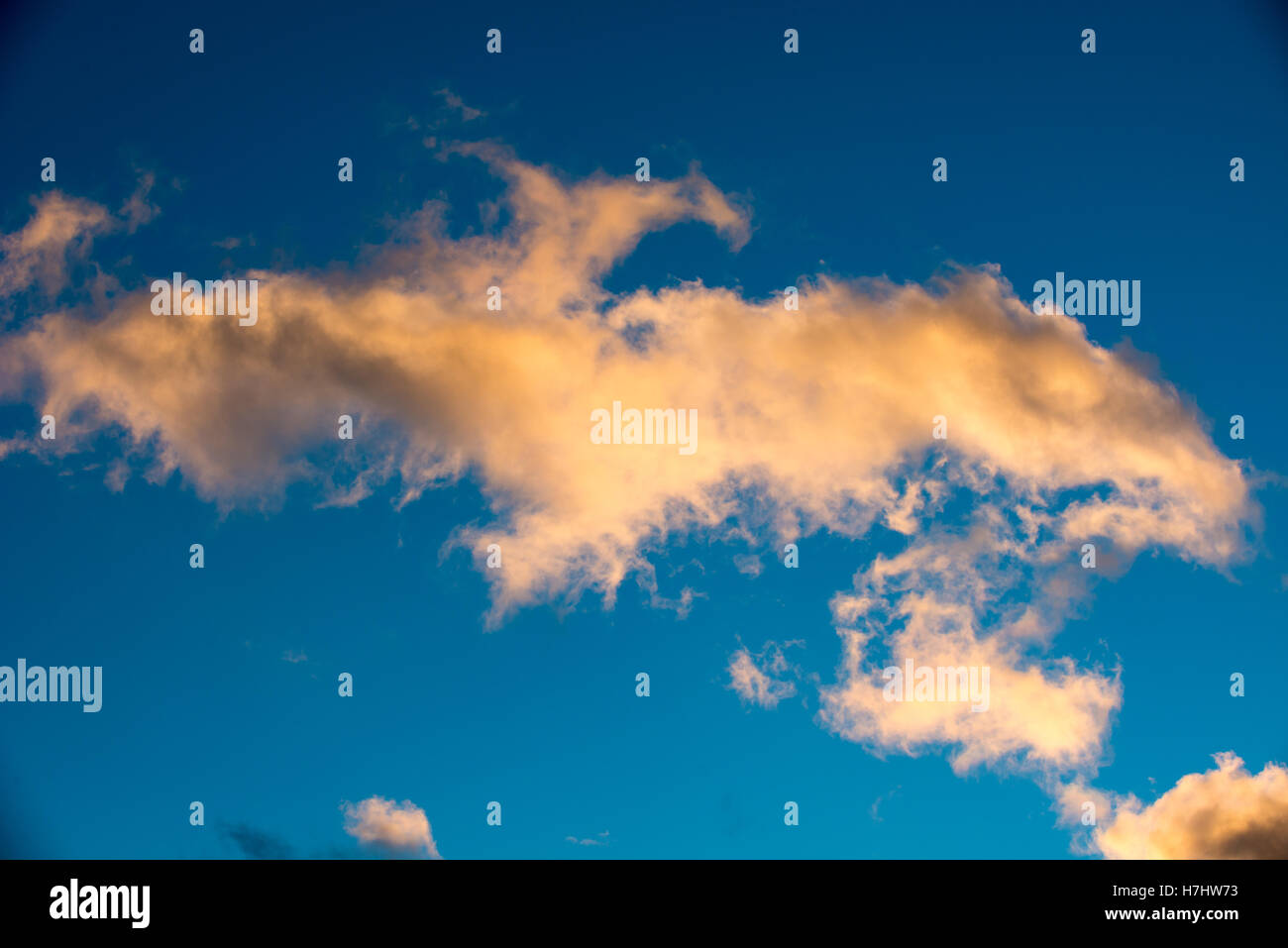 Puffy and colorful sunset clouds Stock Photo - Alamy