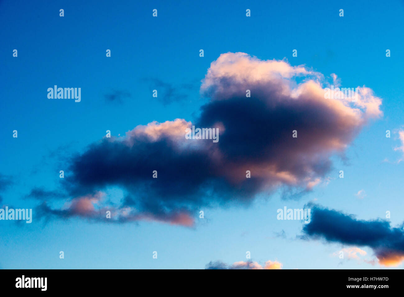 Puffy and colorful sunset clouds Stock Photo - Alamy