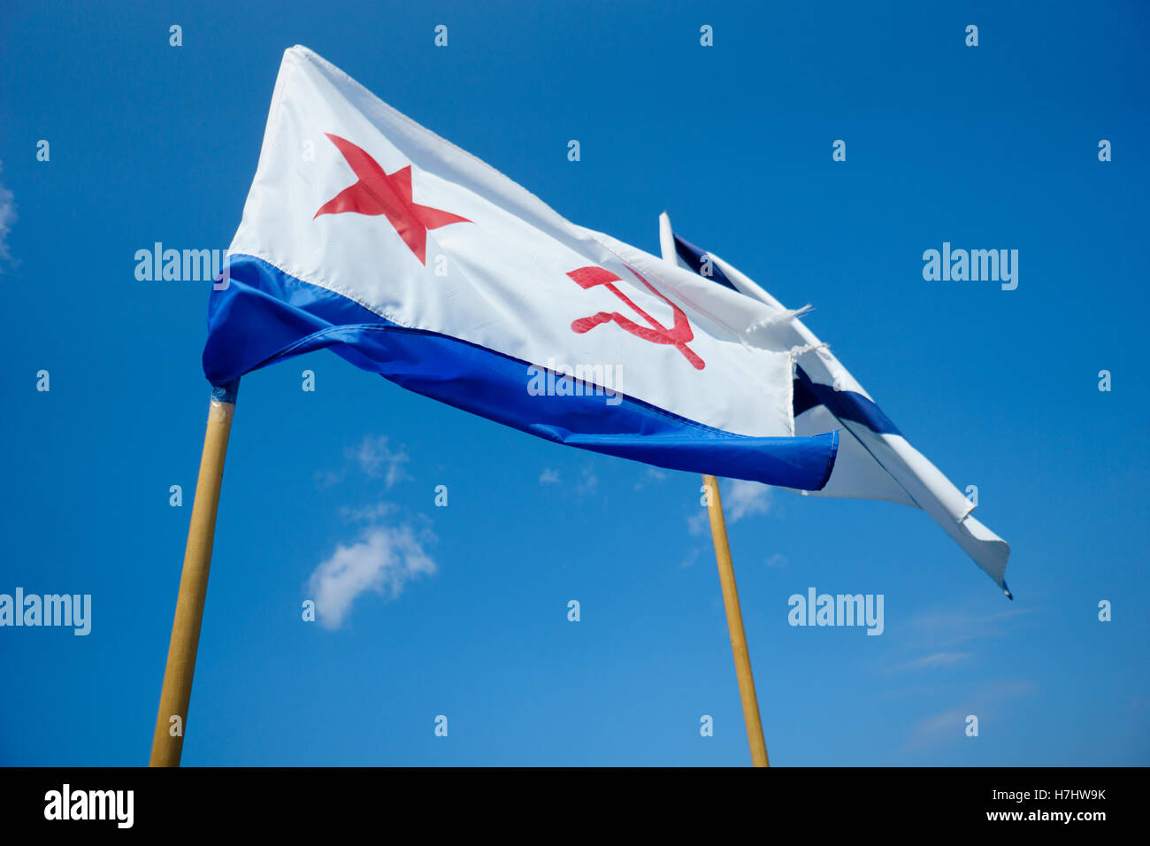 Naval flag of USSR and Russia on blue sky background Stock Photo - Alamy