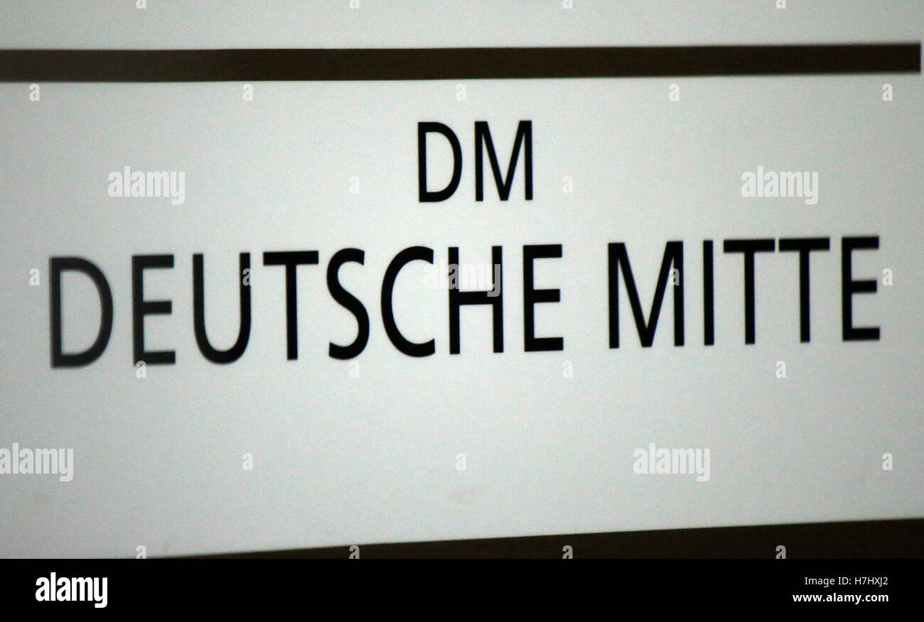 das Logo der Marke "DM Deutsche Mitte", Berlin Stock Photo - Alamy