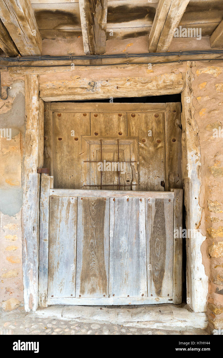 Old gate in a Castilian village Stock Photo - Alamy