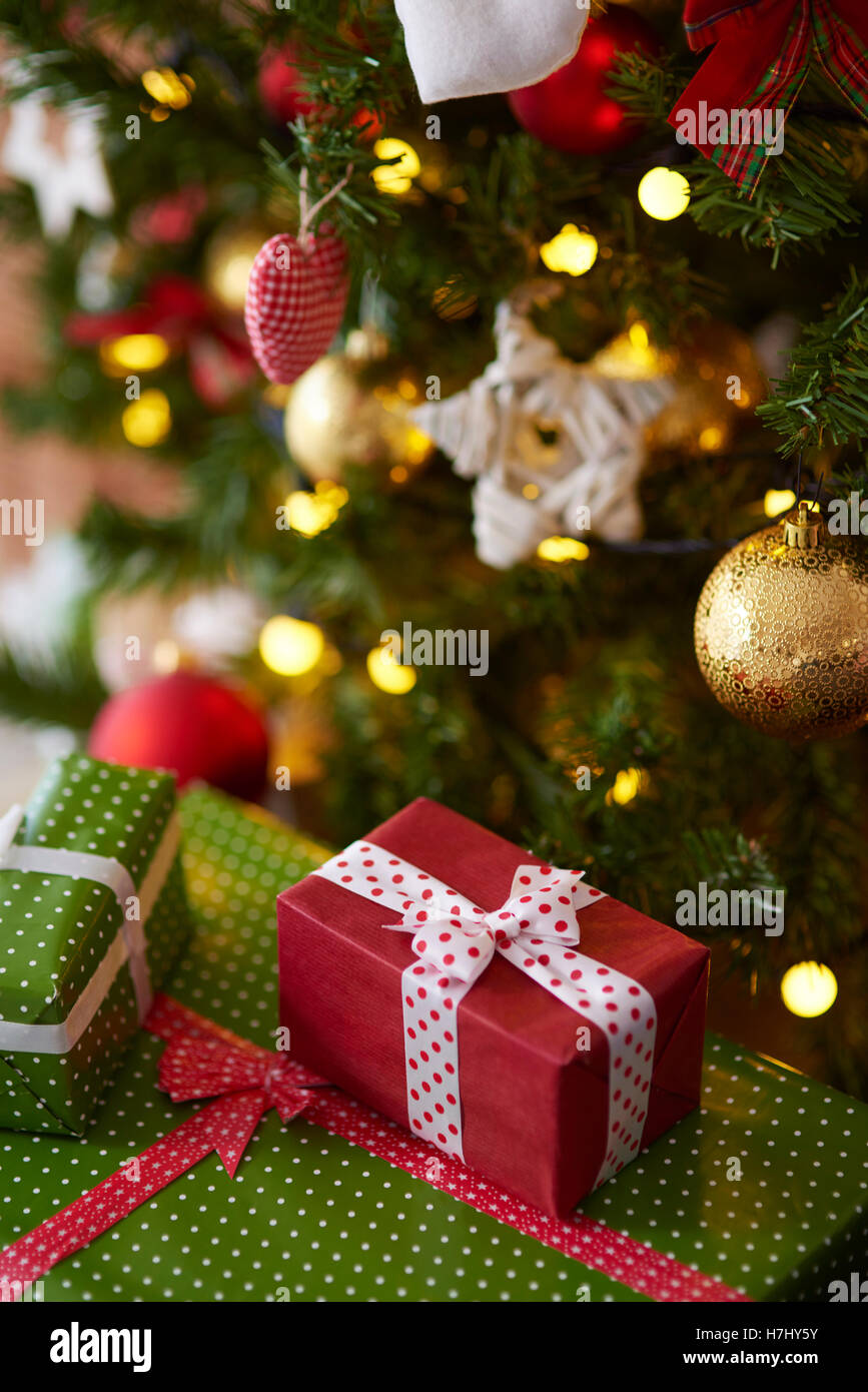 Presents under the Christmas tree Stock Photo - Alamy