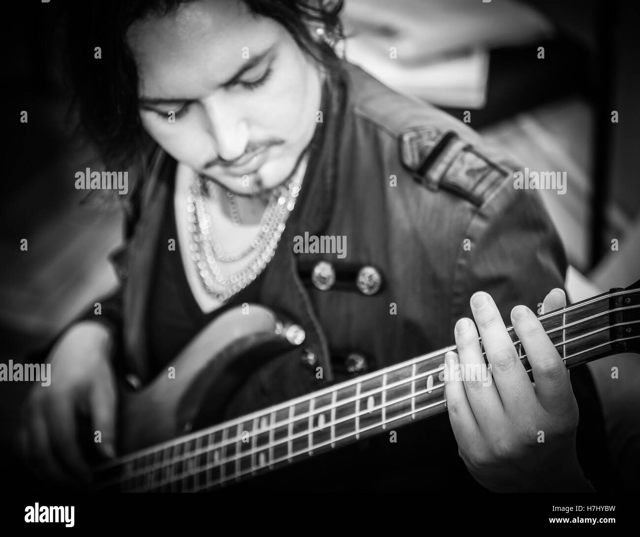 Male model playing electric guitar Stock Photo - Alamy