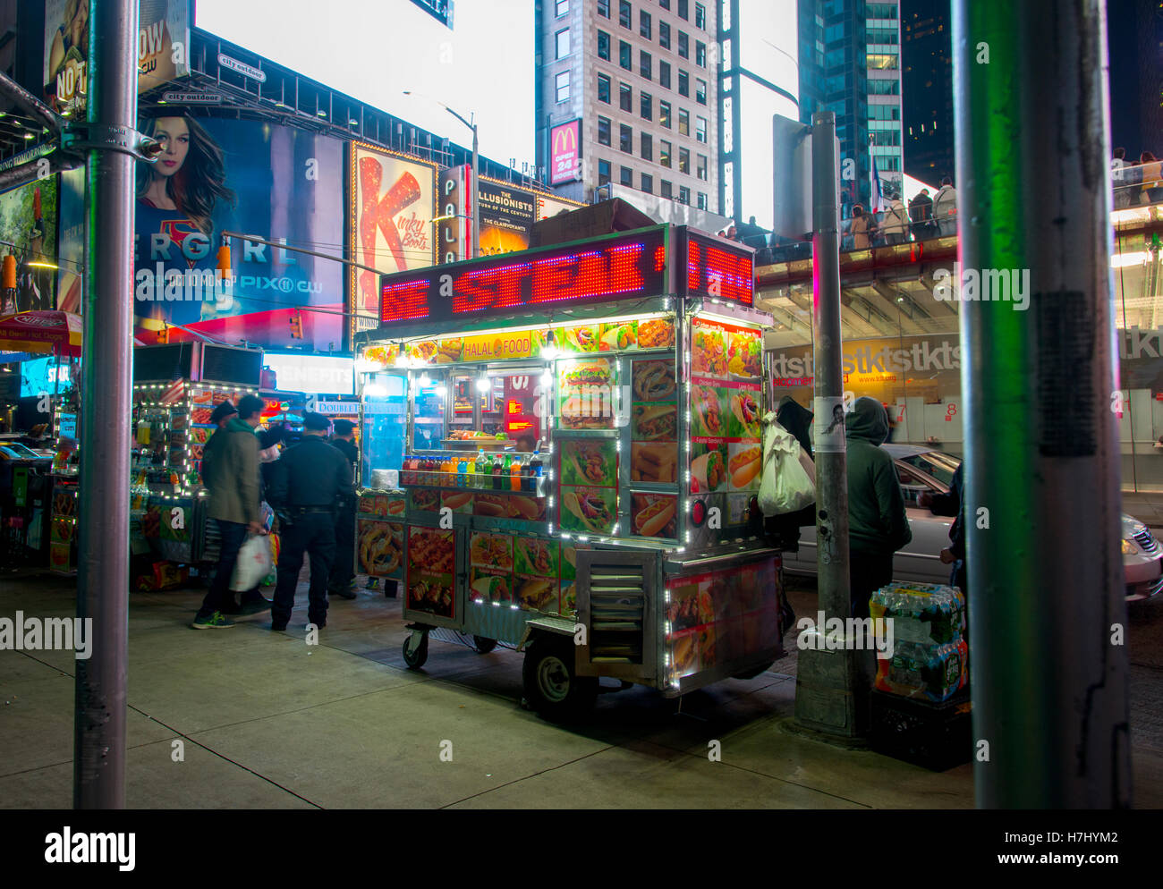 Food cart on the sidewalk in Times Square, New York City Stock Photo ...