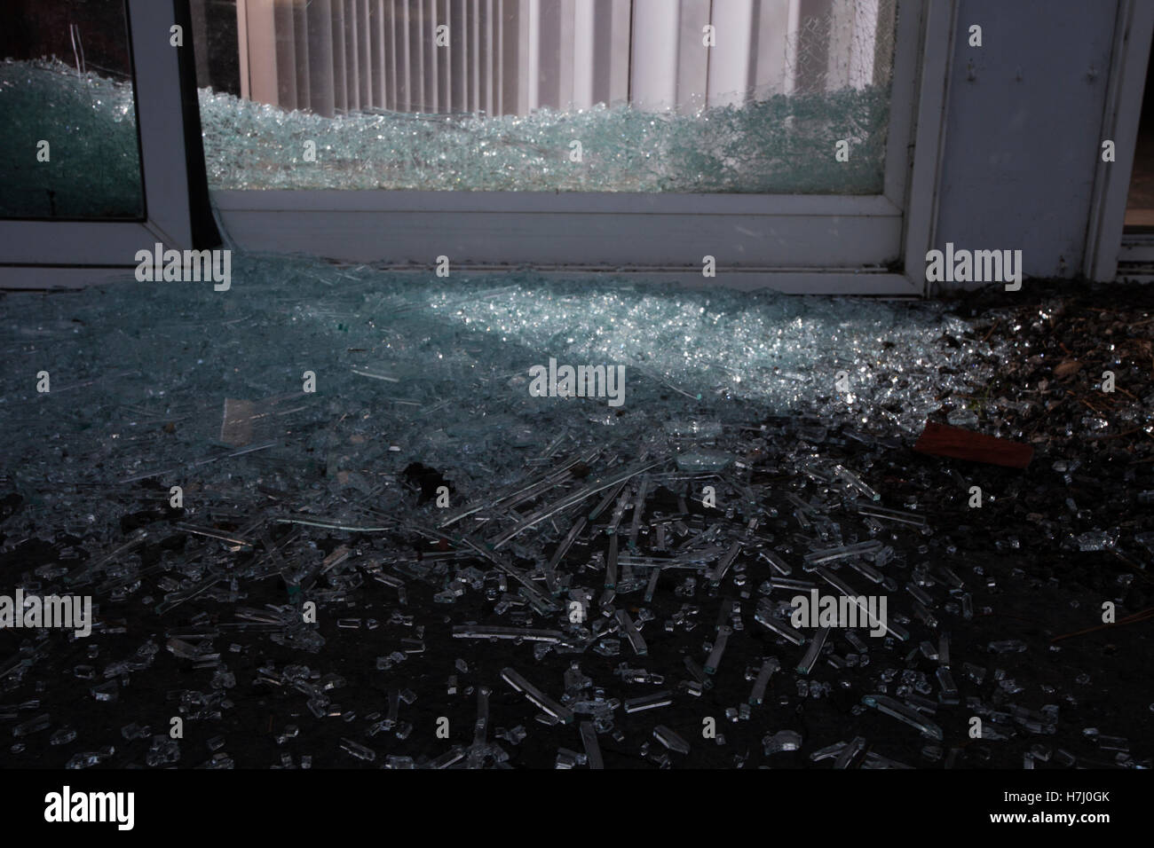 Shattered sliding glass door after a home invader broke in Stock Photo ...