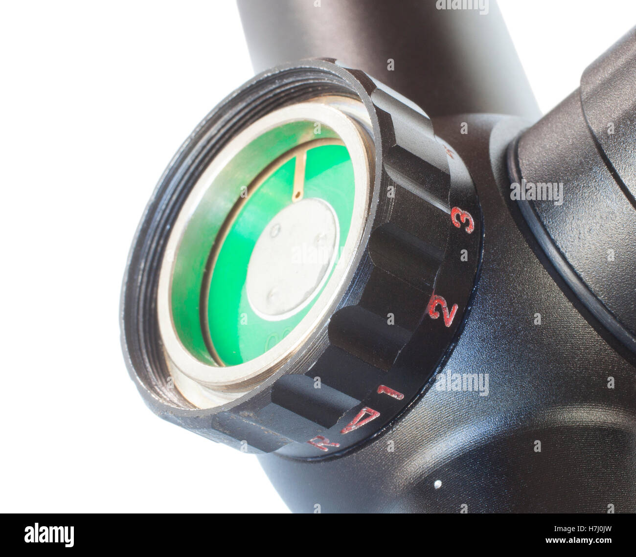 Compartment on the side of a riflle scope that holds a battery for the ...