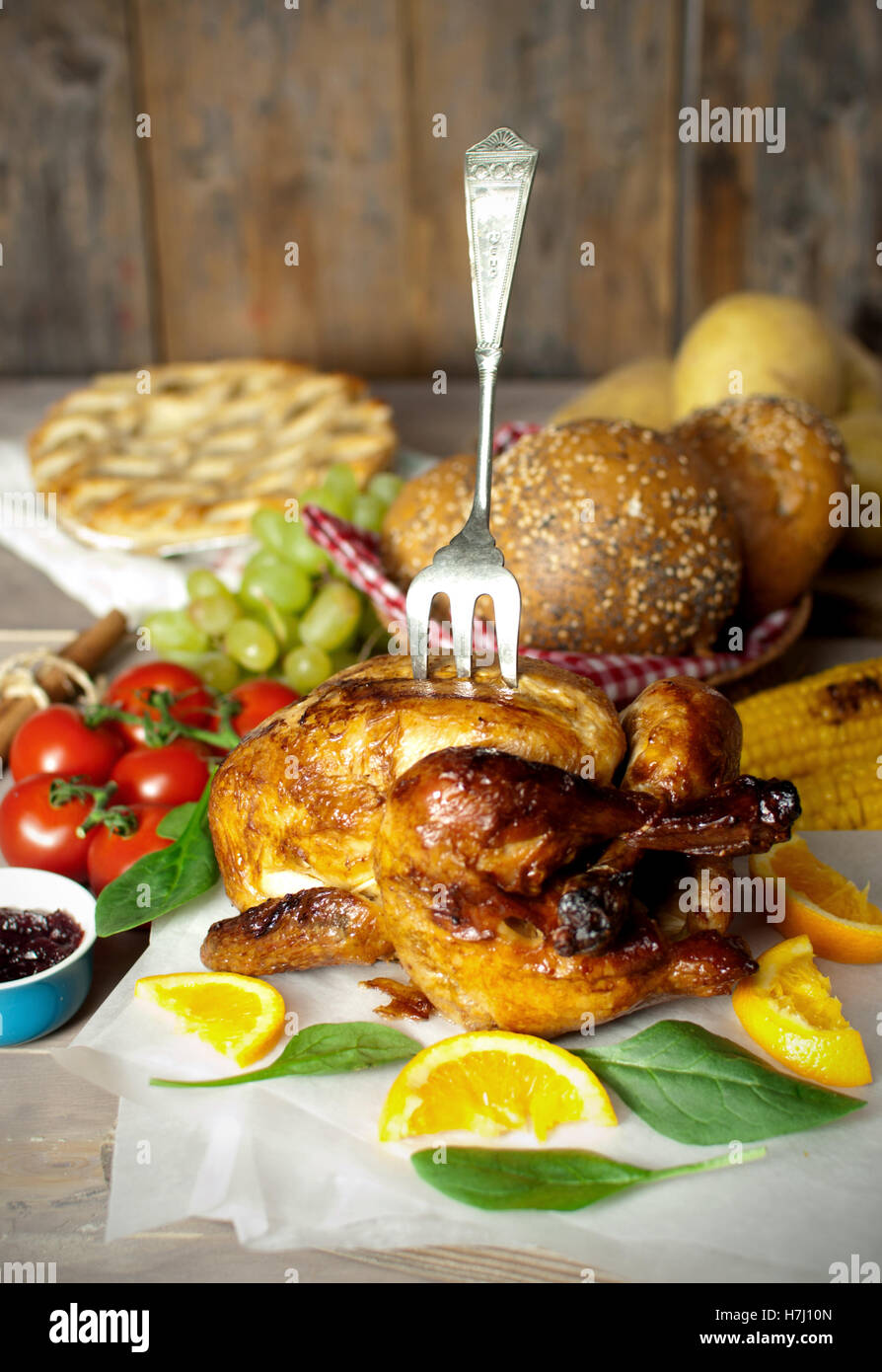 Festive roast turkey with serving fork Stock Photo - Alamy