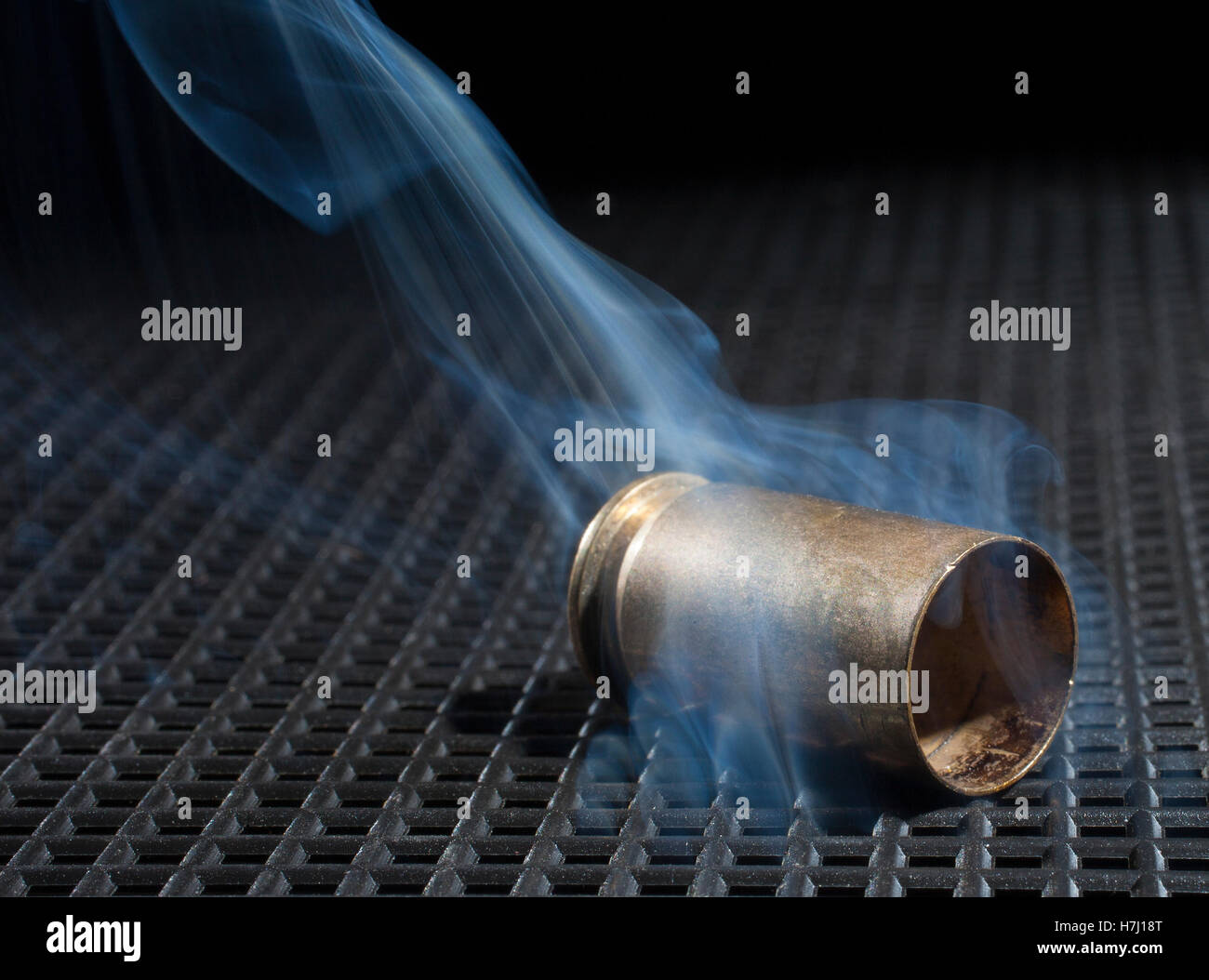 Empty handgun shell on black hi-res stock photography and images - Alamy