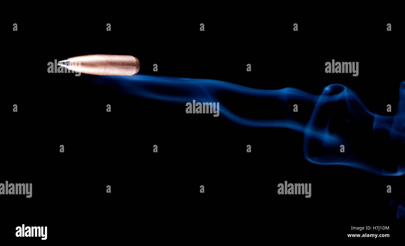 Long trail of blue smoke behind a copper plated bullet with polymer tip ...