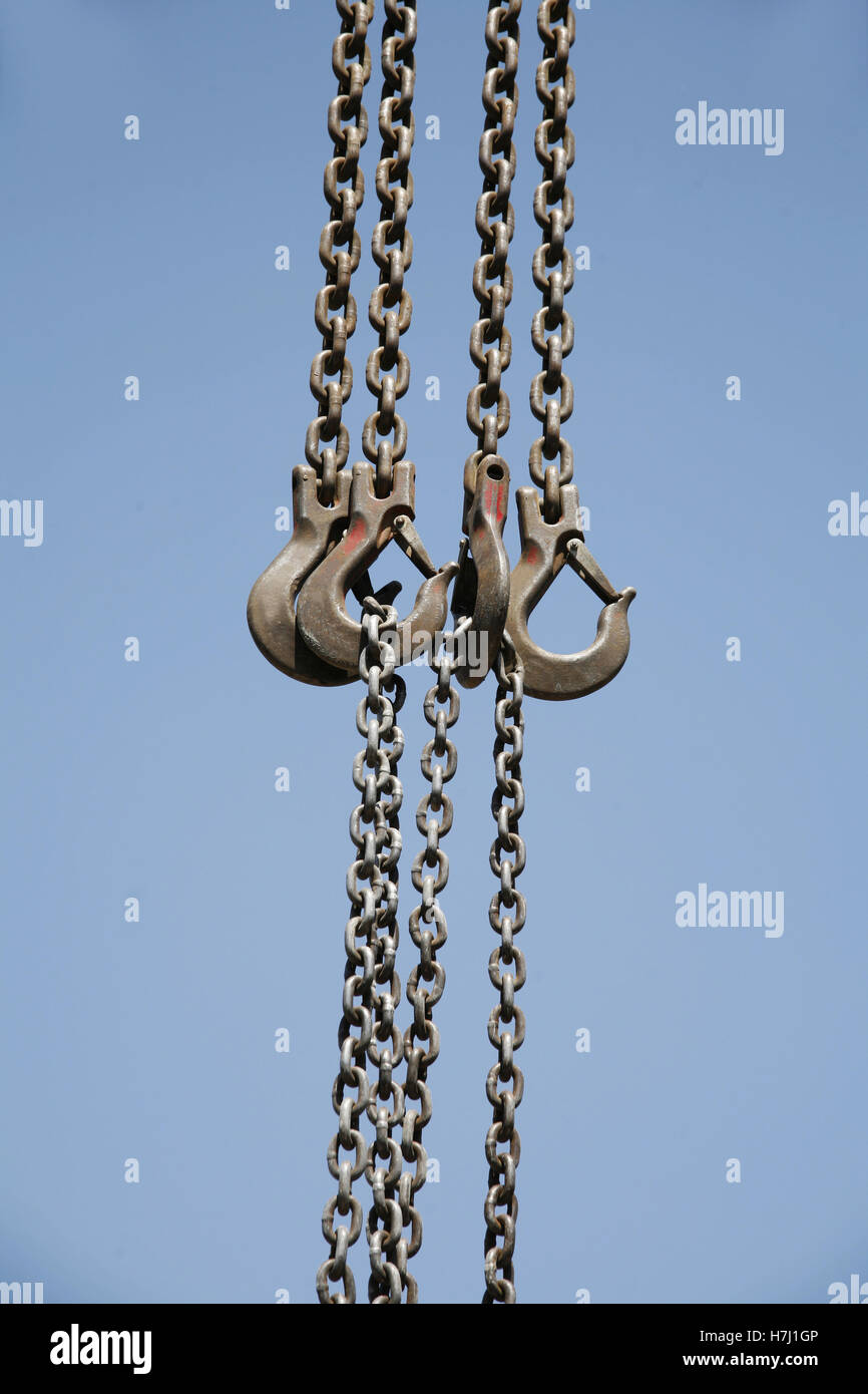 Long rusty chains with crane hook as industrial background Stock Photo ...
