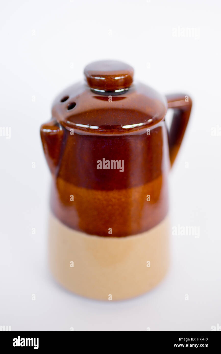 A traditional ceramic pepper shaker Stock Photo - Alamy