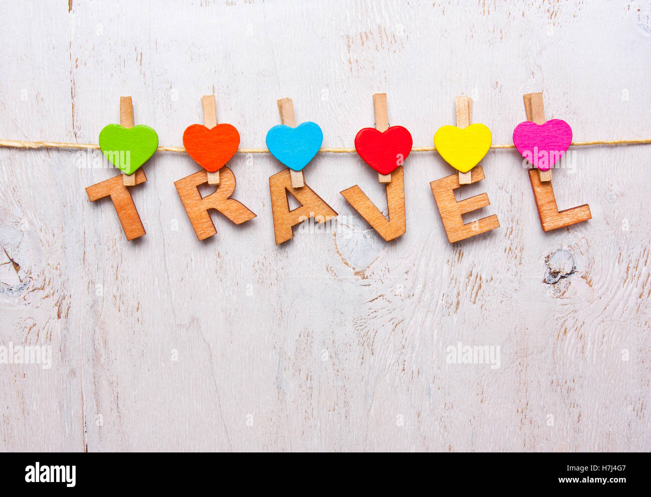 the word "travel" of the wooden letters on a white background Stock ...