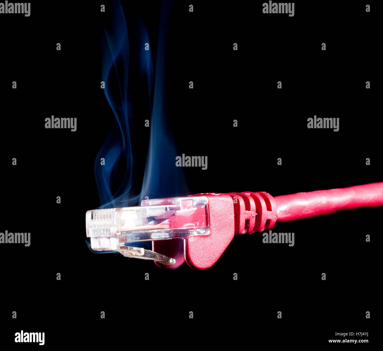 Computer network cable on a black background that is smoking Stock ...