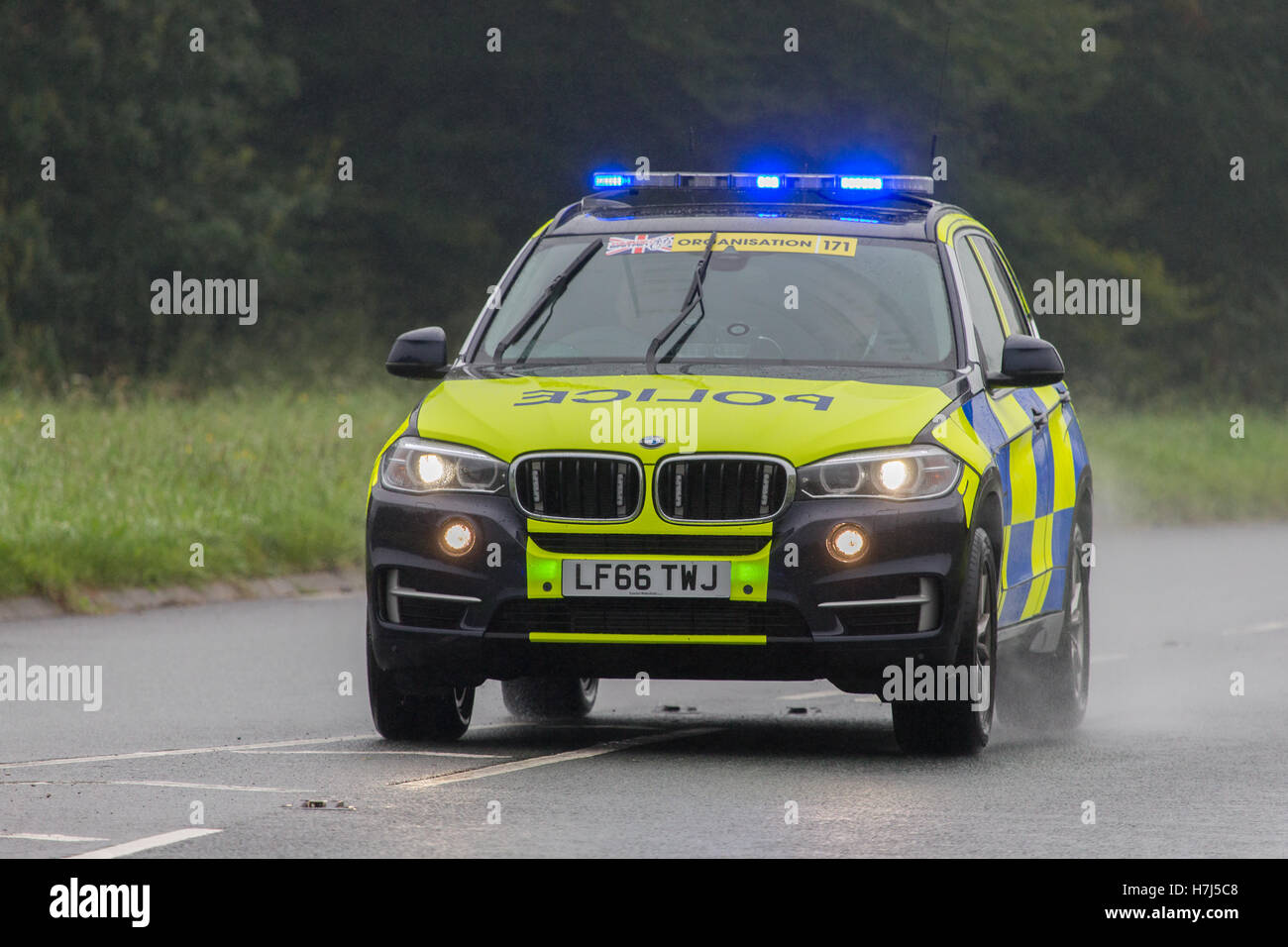 A Police Traffic car clearing the road for the Tour of Britain Cycle ...