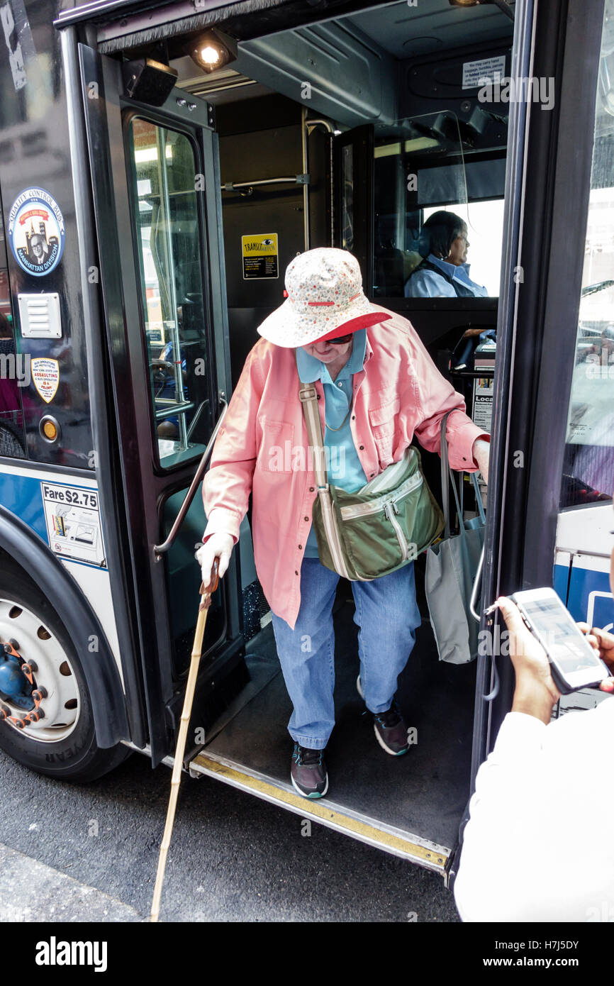 Elderly Woman Bus Stop Stock Photos & Elderly Woman Bus Stop Stock ...