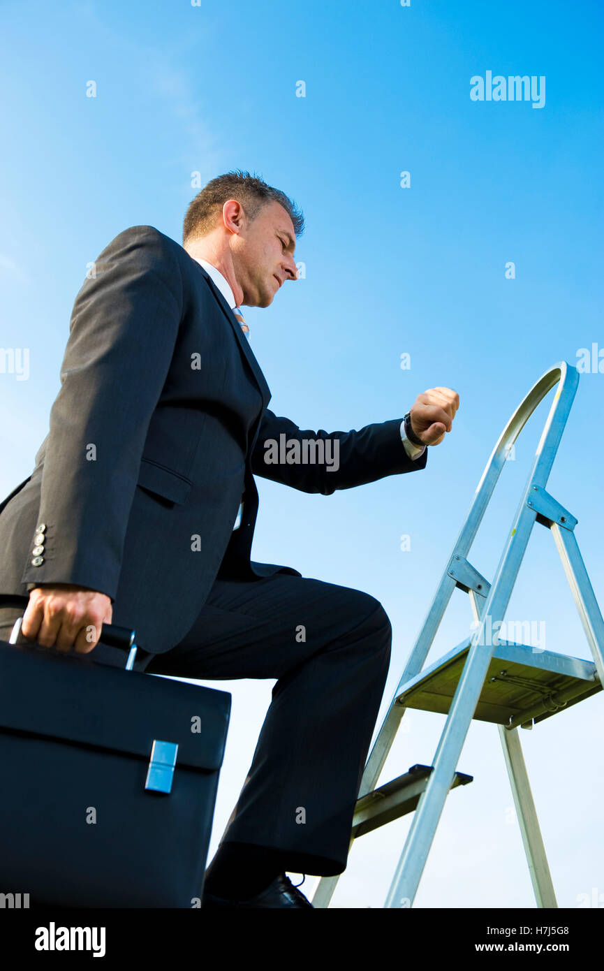 Businessman Climbing Up Ladders High Resolution Stock Photography and ...