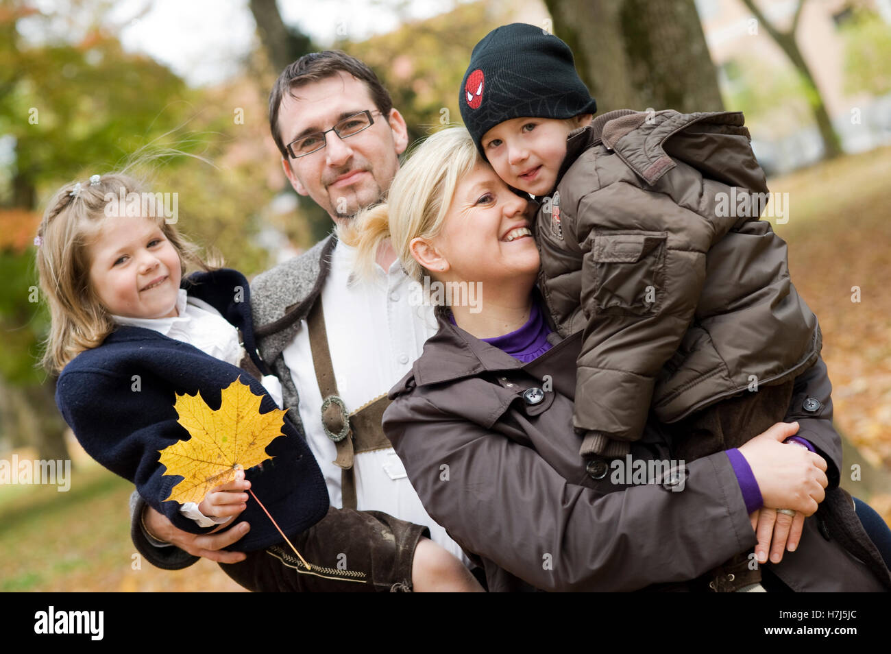 Family in autumn Stock Photo - Alamy