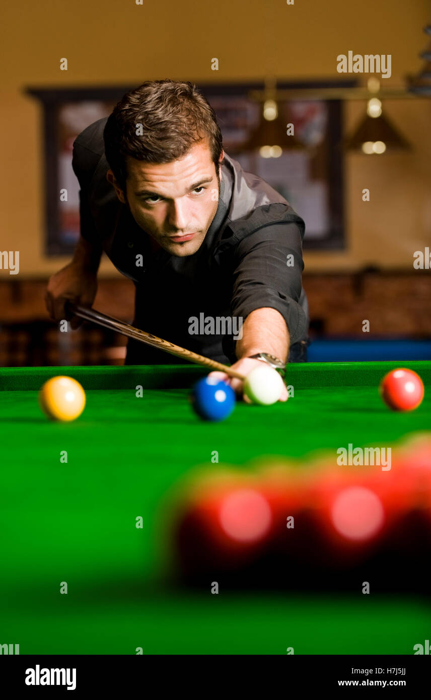 Man playing billiard Stock Photo - Alamy