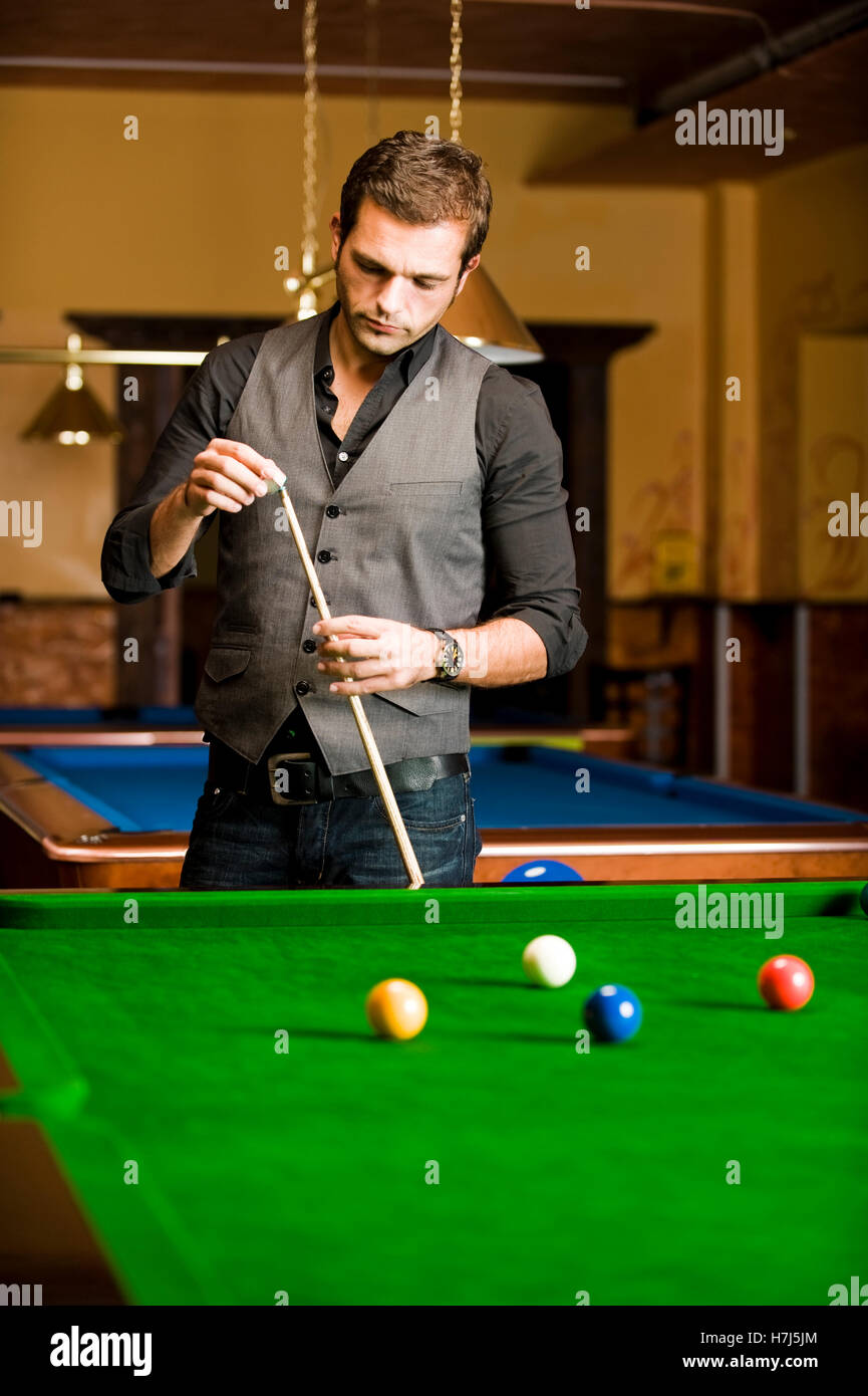 Man playing billiard Stock Photo - Alamy
