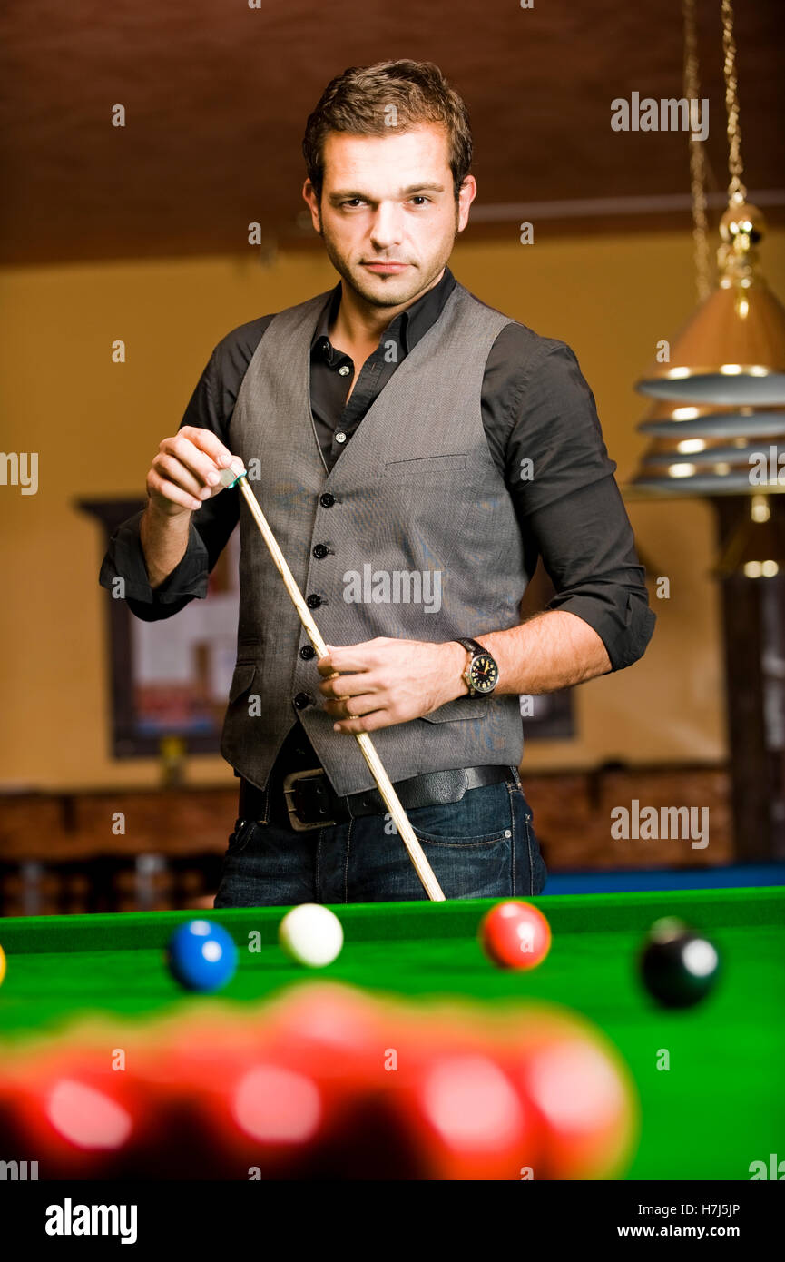 Man playing billiard Stock Photo - Alamy