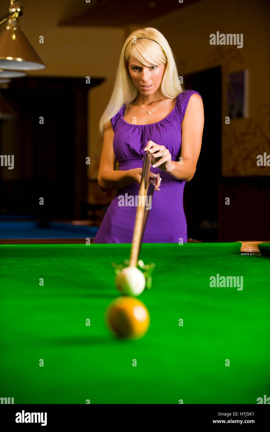 Woman holding pool cue hi-res stock photography and images - Alamy