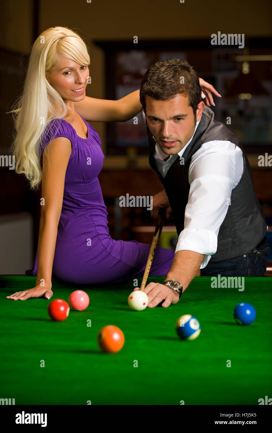 Two women play billiards hi-res stock photography and images - Alamy