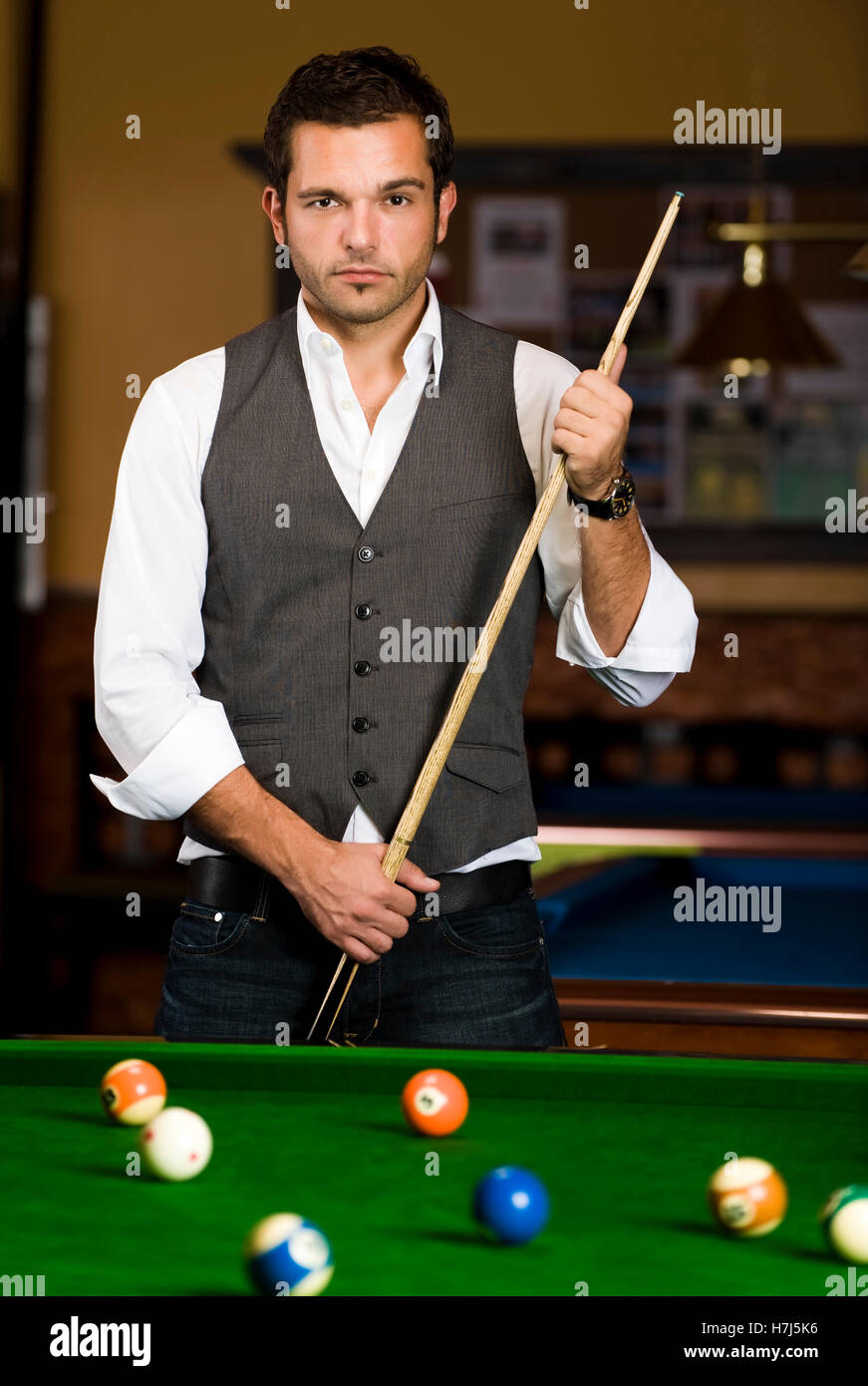 Man playing billiard Stock Photo - Alamy