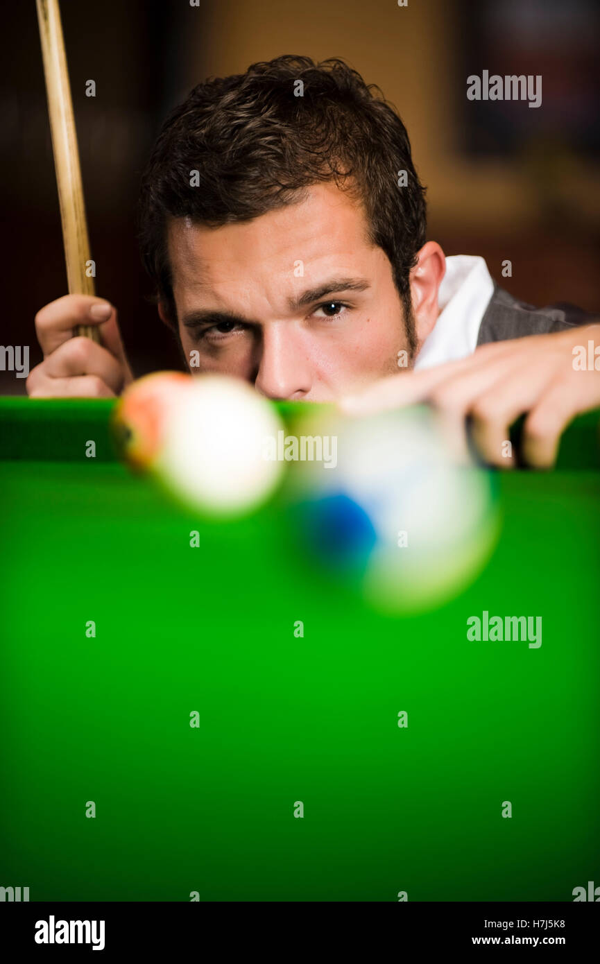 Man playing billiard Stock Photo - Alamy
