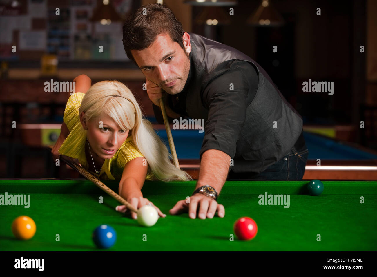 Two women play billiards hi-res stock photography and images - Alamy