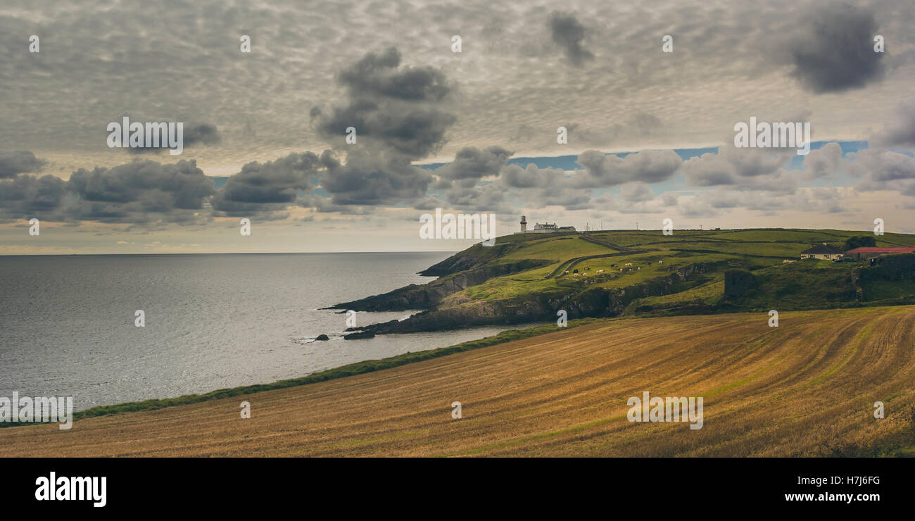 A beautiful view of the galley head lighthouse from a distance. Ireland ...