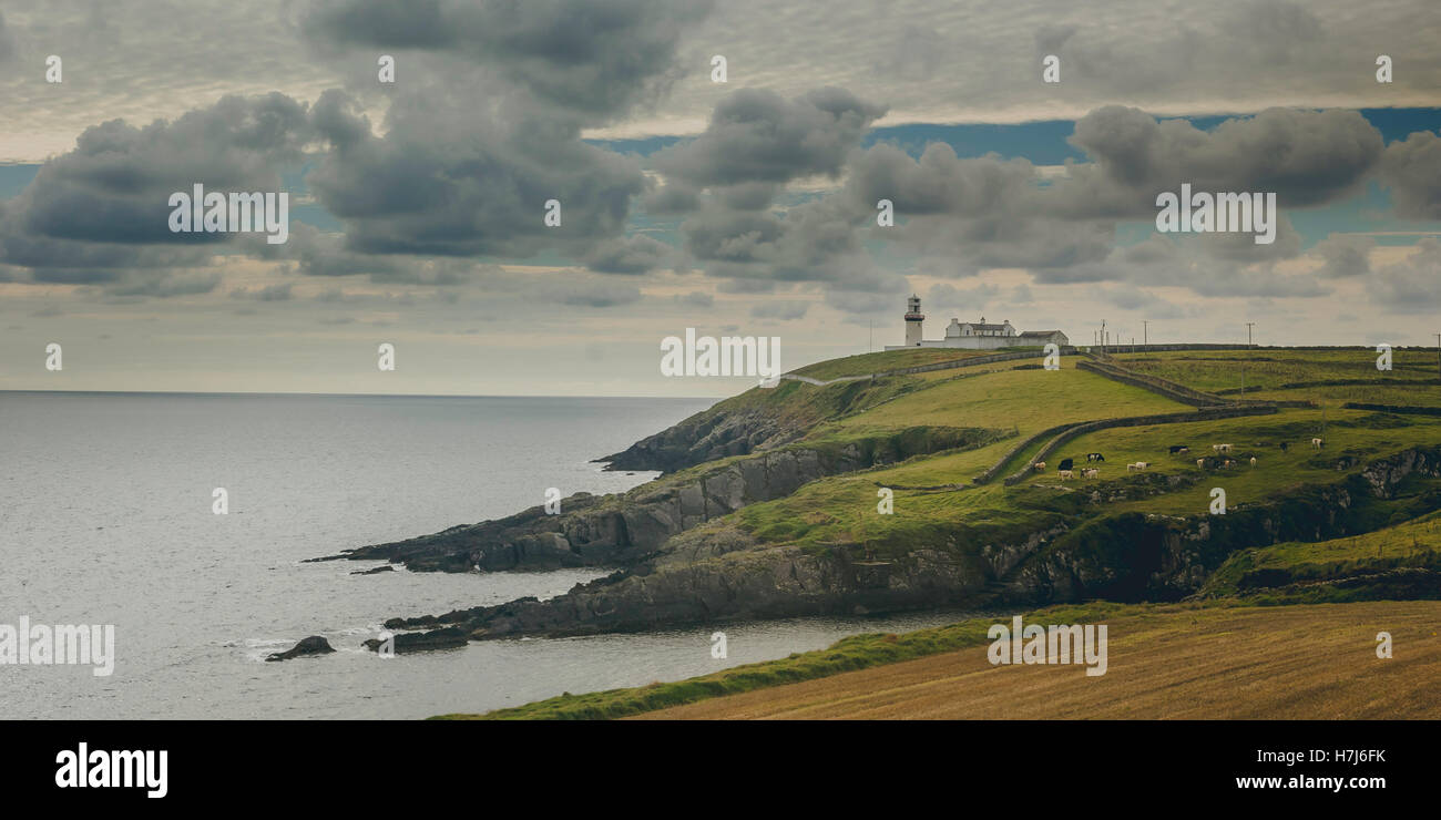 A beautiful view of the galley head lighthouse from a distance. Ireland ...