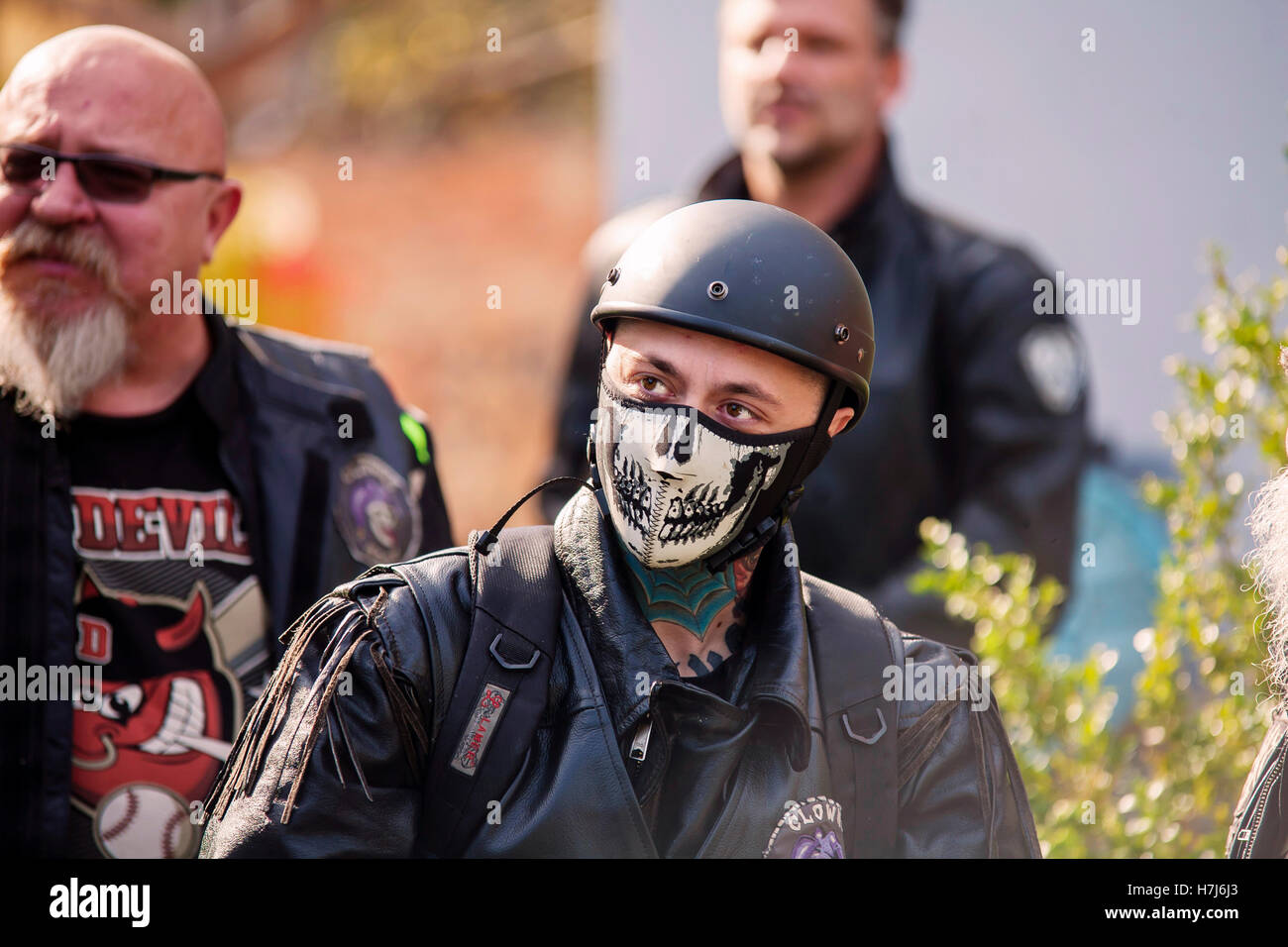 Young man wearing motorbike mask Stock Photo - Alamy