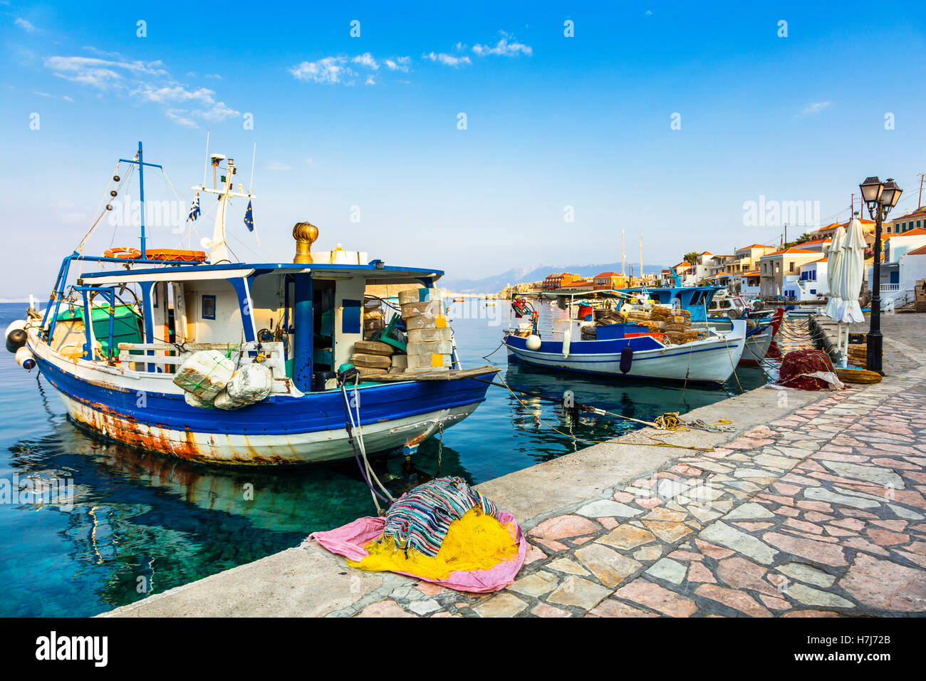 Impressive Chalki island,view with traditional fishing boats and houses ...
