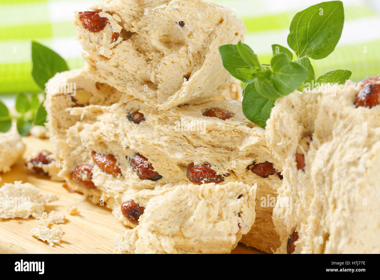 Pieces of Greek halva with almonds Stock Photo - Alamy