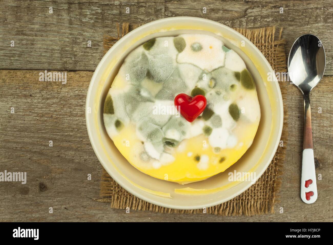 Moldy pudding and syringe. Treatment of the disease. Mold and ...