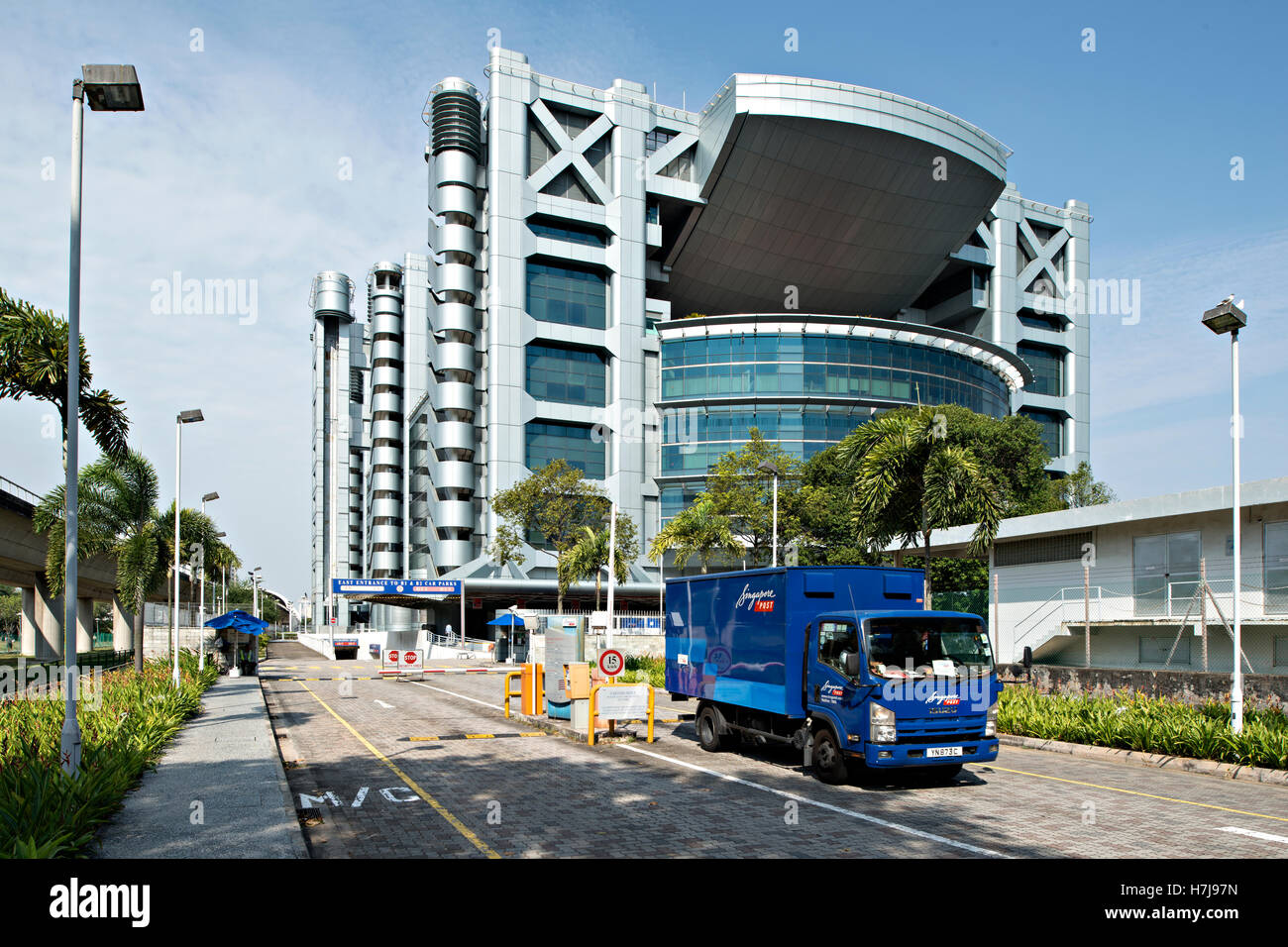 A postal truck leaves the Singapore Post Centre in Paya Lebar ...