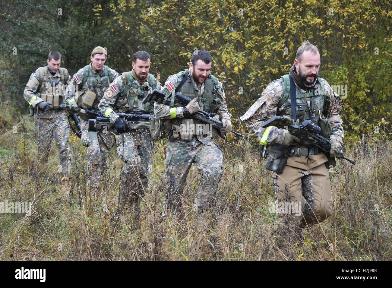 Lithuanian soldiers participate in the Rough Terrain Run during the ...