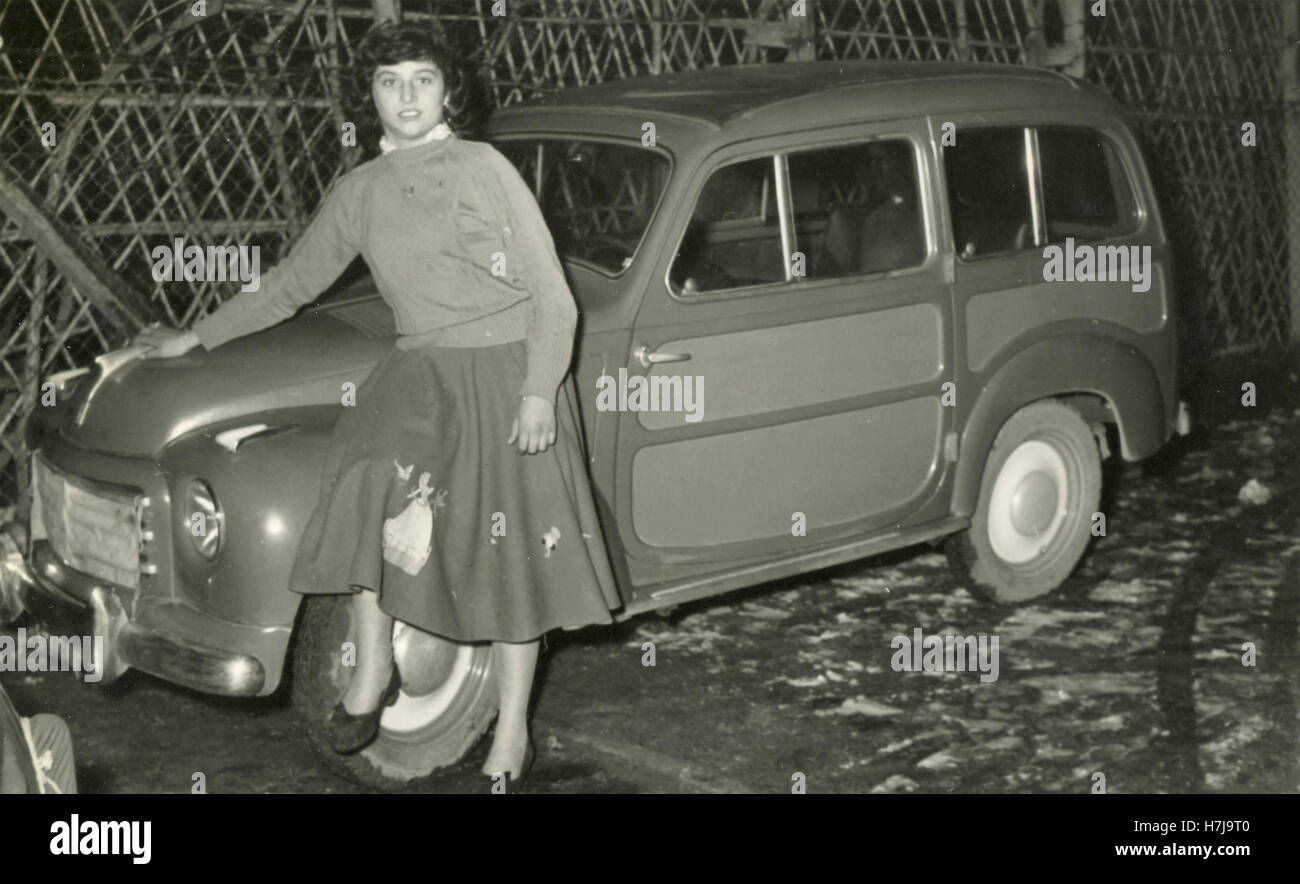 Girl sitting on a FIAT 500 Giardiniera car, Italy Stock Photo - Alamy