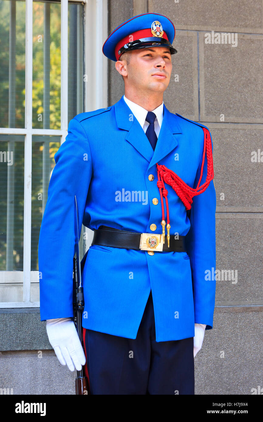 Armed man holding up man in hat hi-res stock photography and images - Alamy