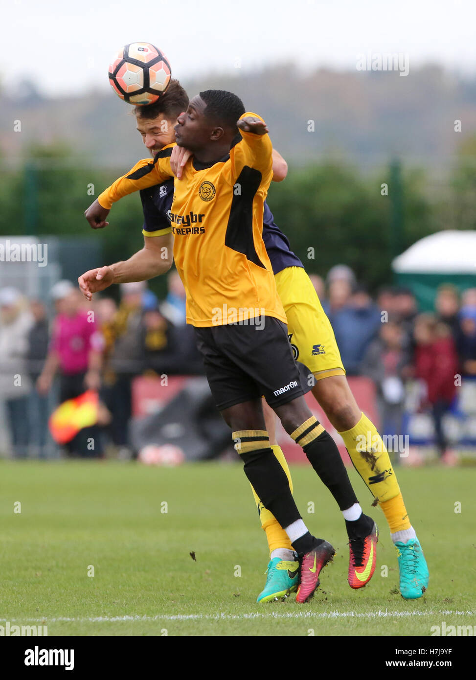 Merstham's Dan Hector (front) and Oxford's Aaron Martin battle for the ...