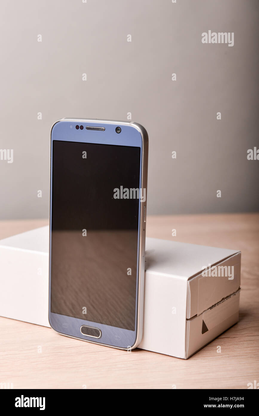 Perfectly detailed modern smart phone on a desk Stock Photo - Alamy