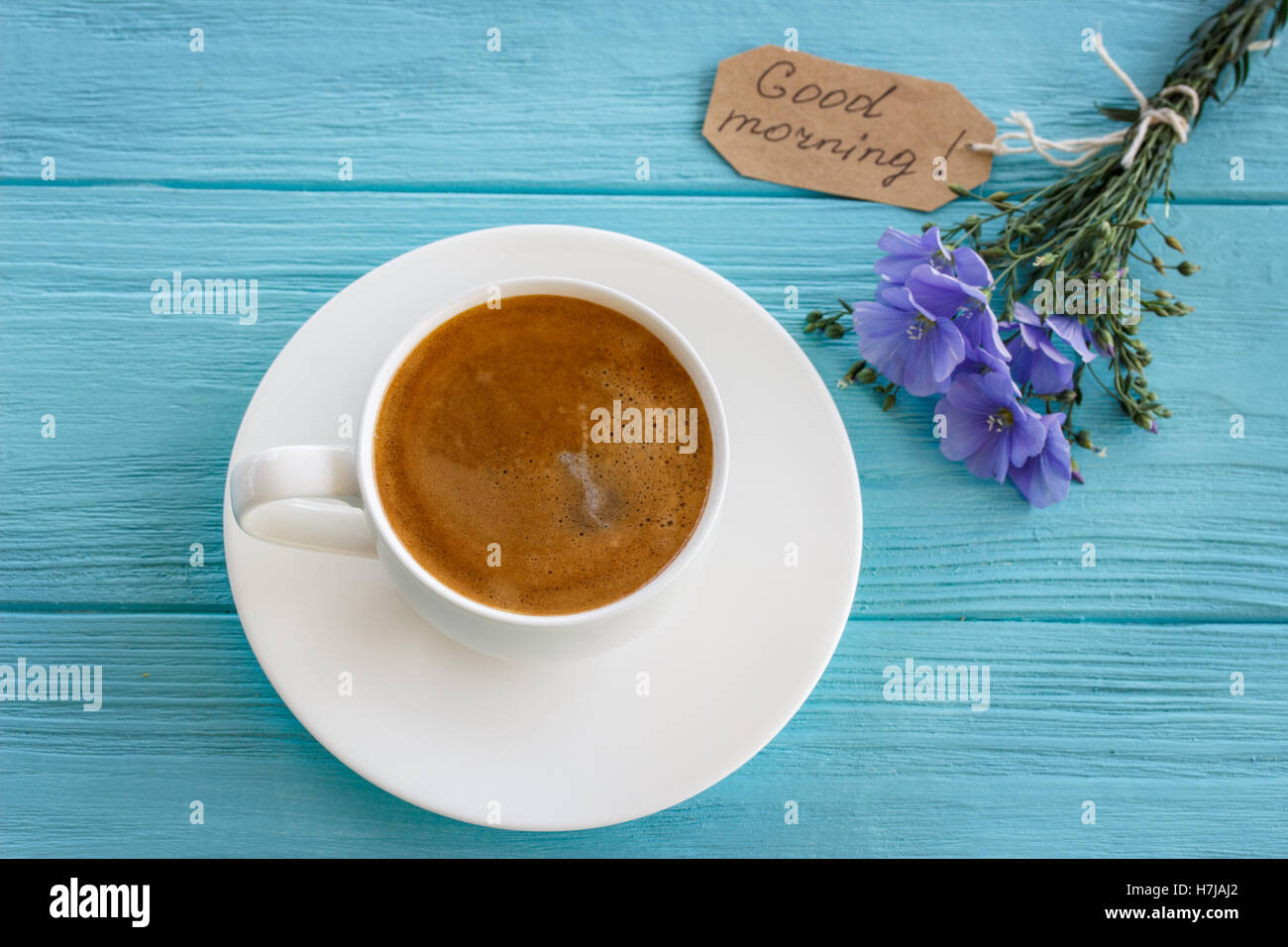 Coffee mug with blue flowers and notes good morning on blue rustic ...