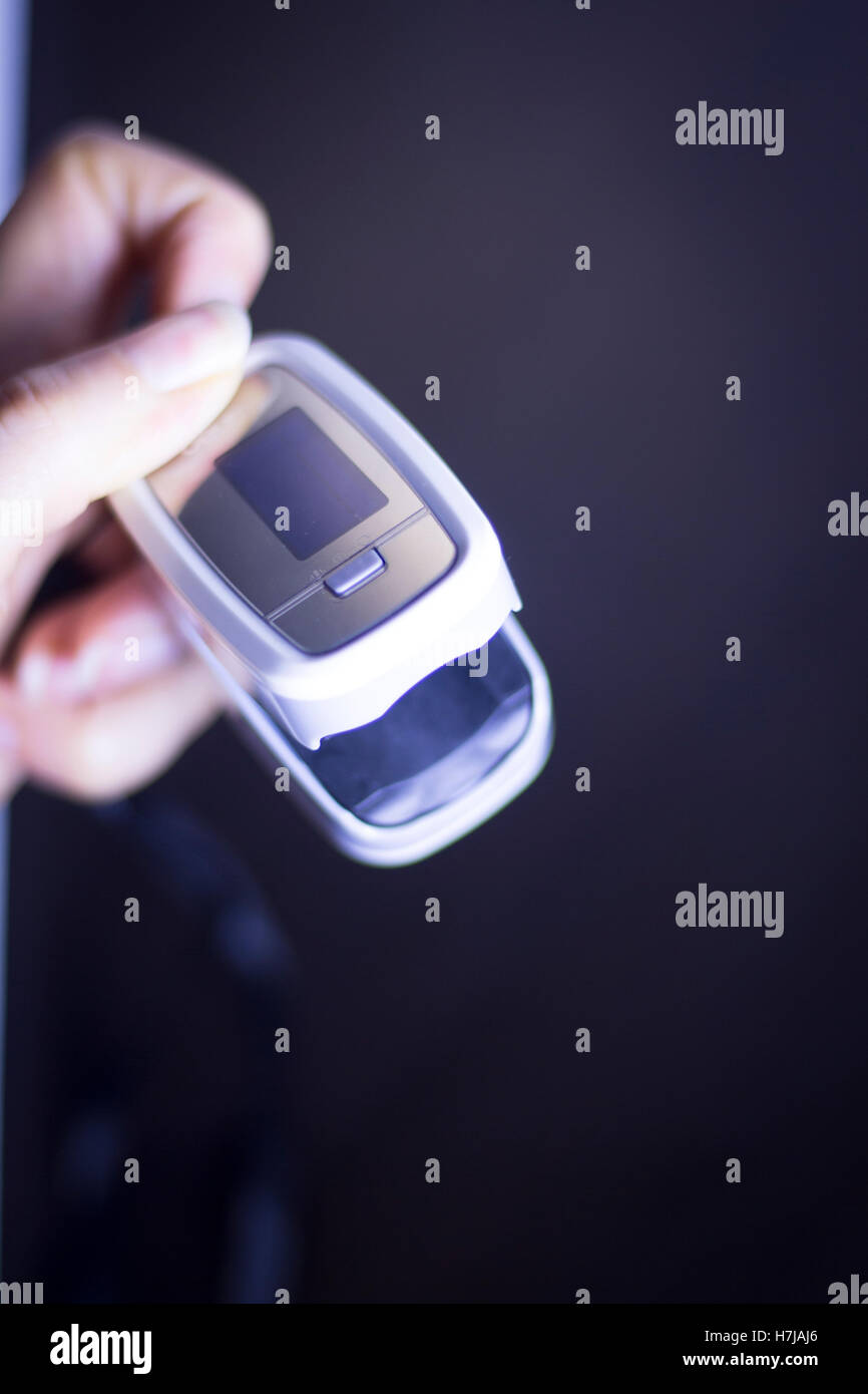 Portable hand held mini domestic cardiac finger pulse rate meter to ...