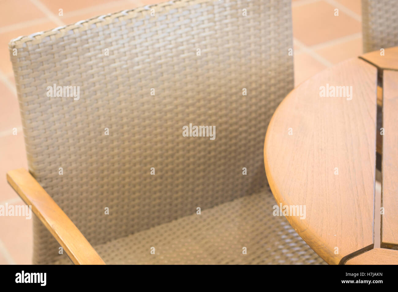 Outdoor wooden summer terrace furniture table and chairs set in hotel ...