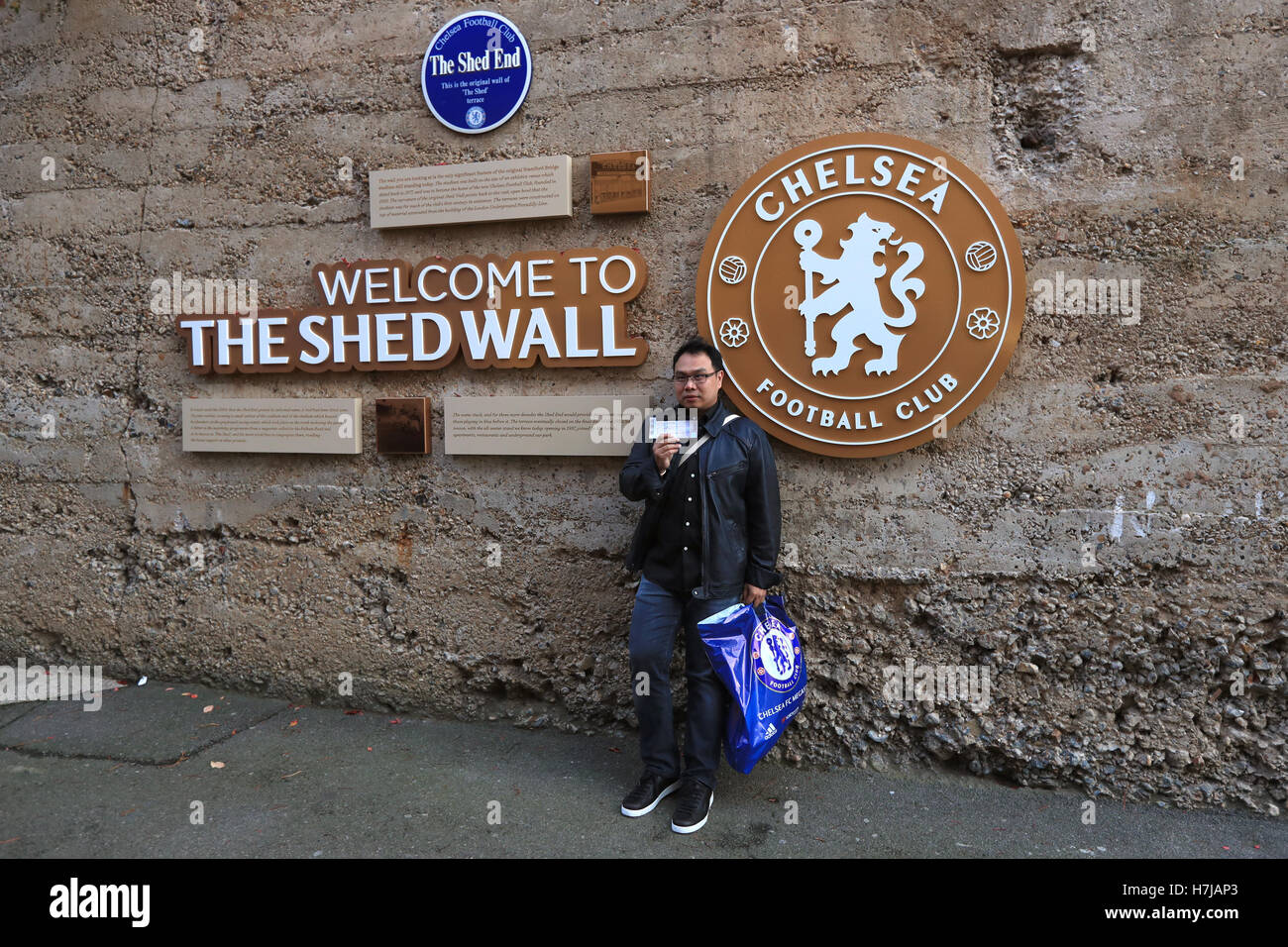 A fan poses by the Shed Wall during the Premier League match at ...