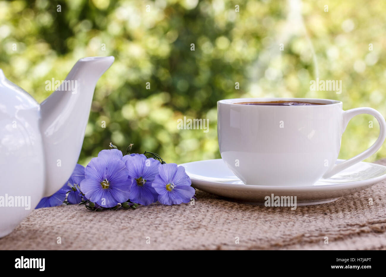 Coffee mug with blue flowers and notes good morning on blue rustic ...