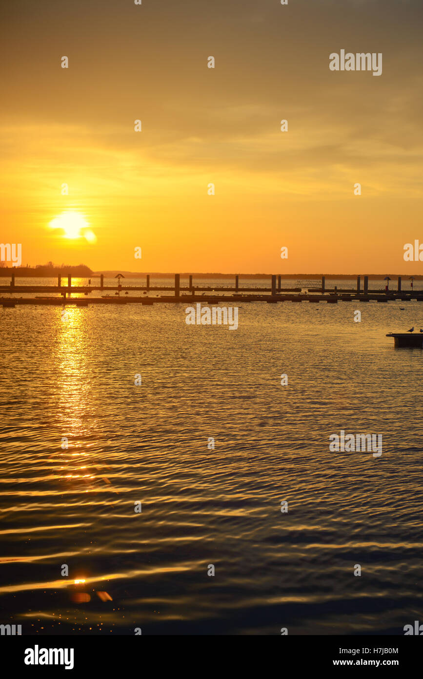 Yacht port over beautiful orange sunset in summer time Stock Photo - Alamy