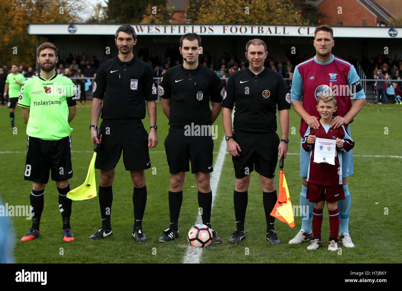 Westfields' captain Phil Glover with Curzon Ashton captain Alex Brown ...