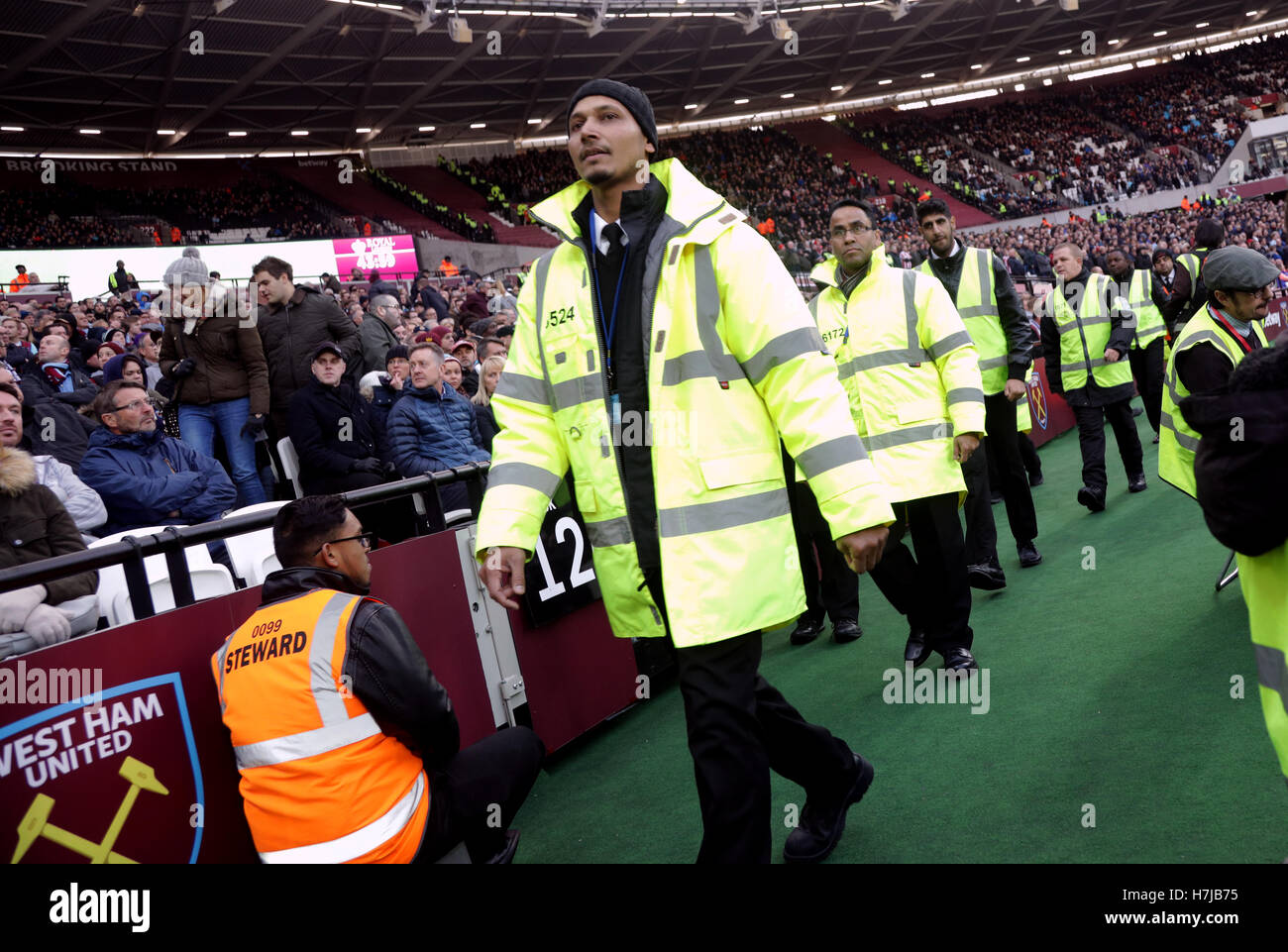 Stewards pitch side during the Premier League match at London Stadium ...