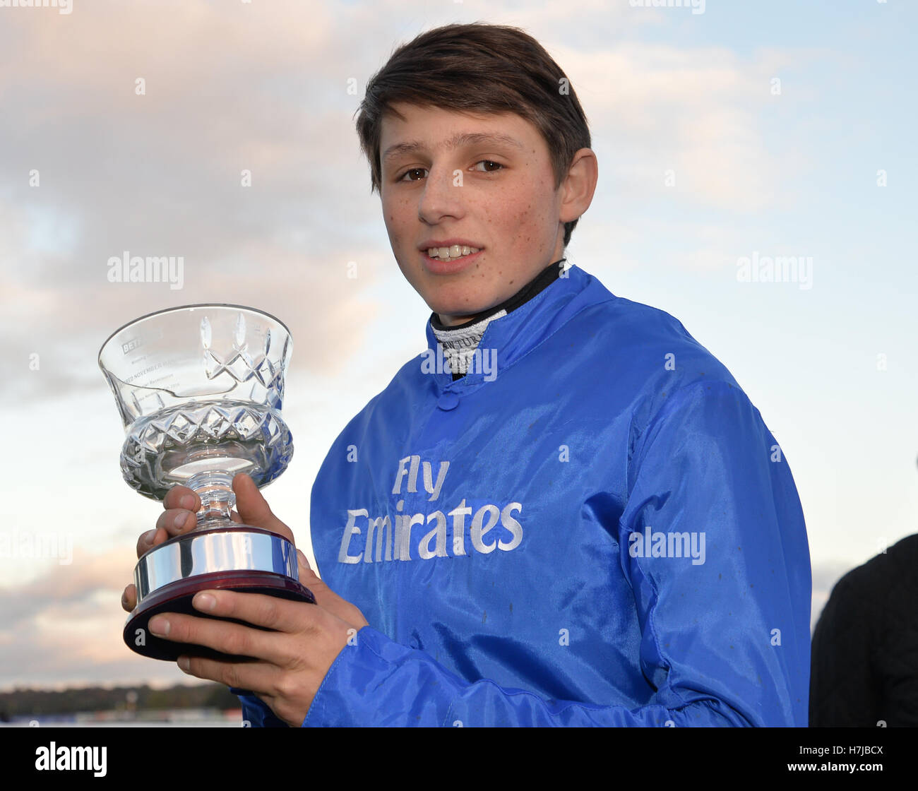 Jockey George Wood with his trophy after winning the Betfred November ...